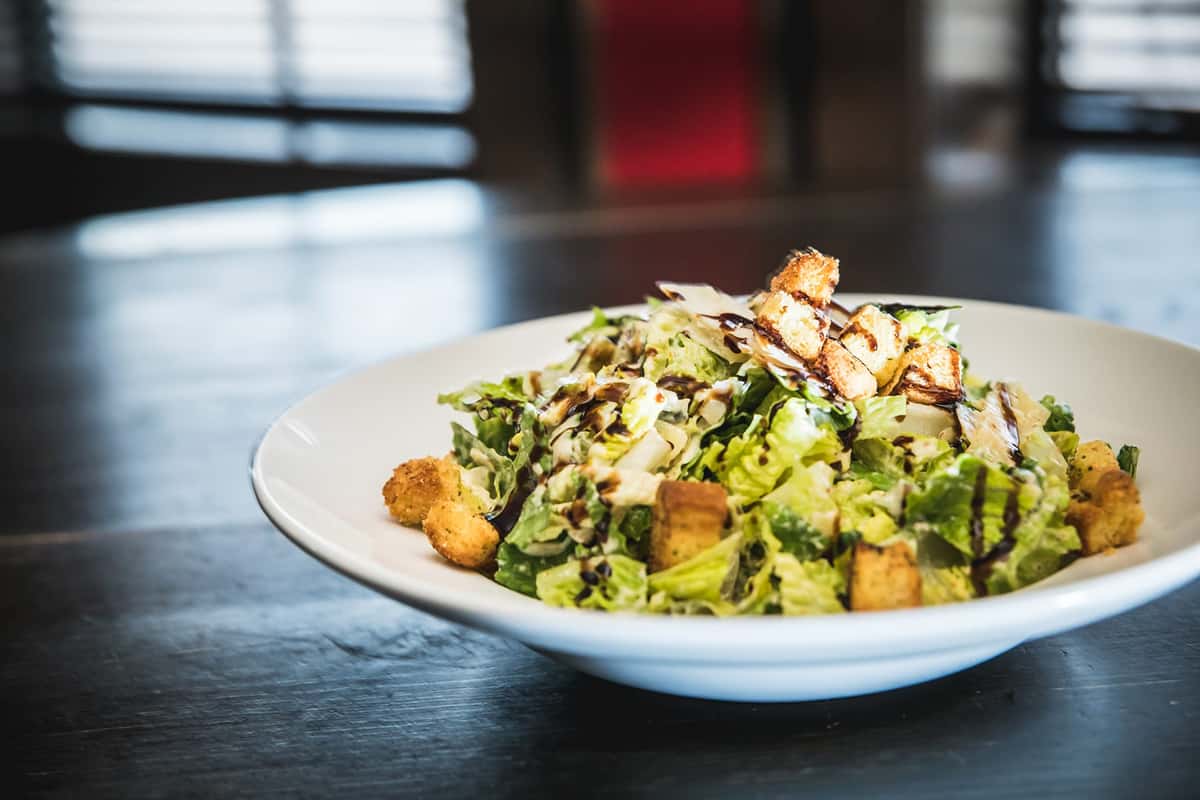 Caesar Salad - Breakfast + Lunch Menu - Red's Kitchen + Tavern