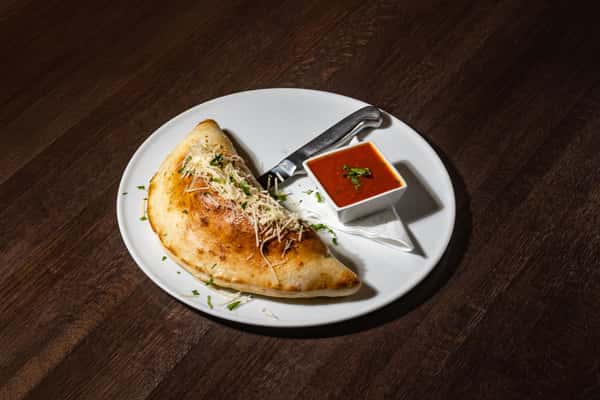 4 Cheese Calzone - EATaliano Kitchen Bar - Italian Restaurant in GA
