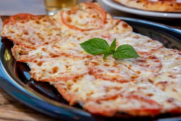 Margarita Flatbread - Menu - Deli Lane Café & Sunset Tavern