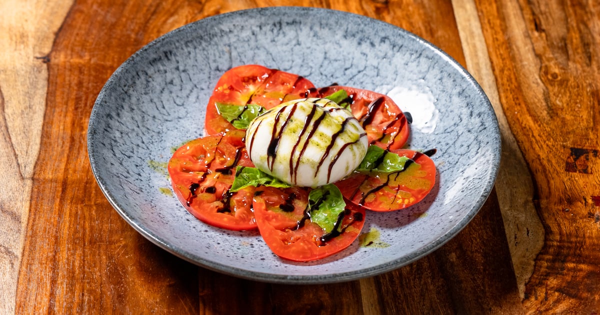 BURRATA TRUFFLE & TOMATO - Nukha - Restaurant & Lounge