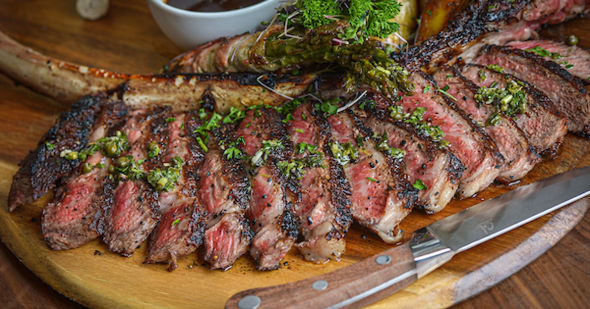 40oz Prime Tomahawk Ribeye for Two - The Vault Uptown - Bar & Grill in ...