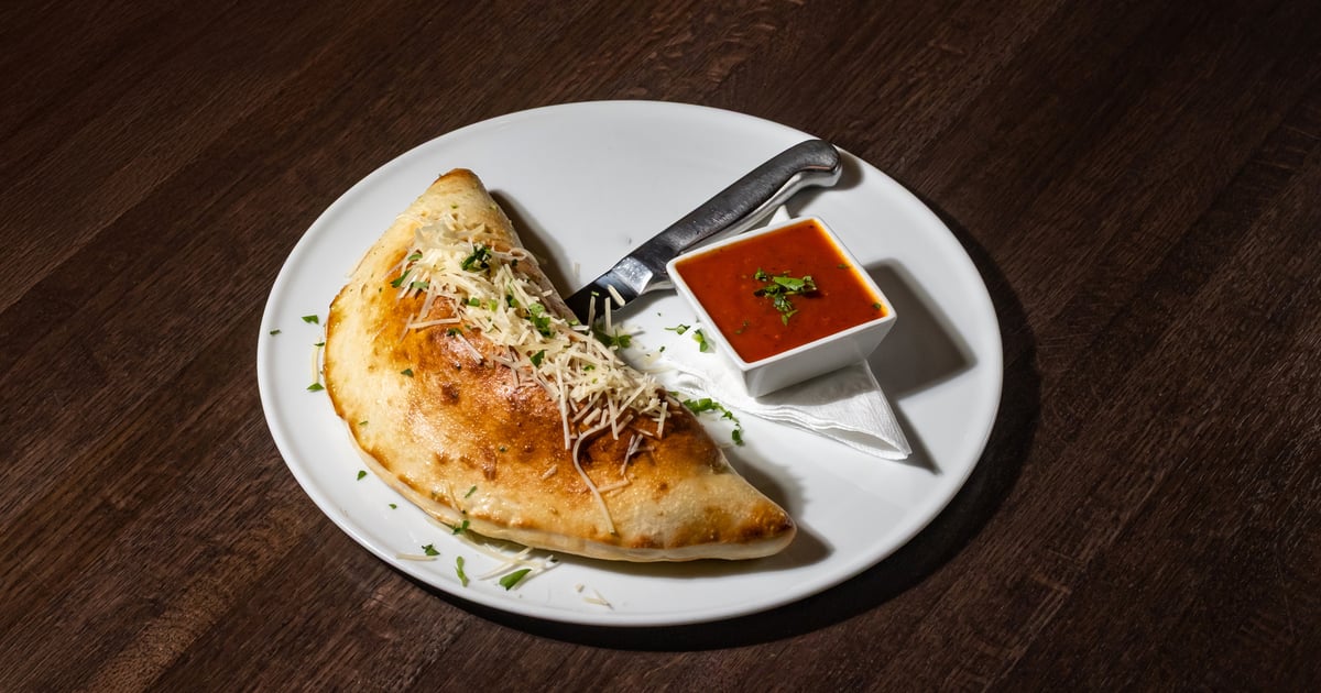 4 Cheese Calzone - EATaliano Kitchen Bar - Italian Restaurant in GA