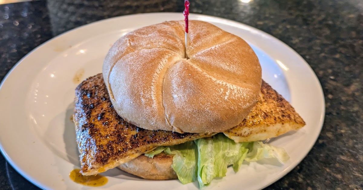 Hanging Off the Bun Mahi Sandwich - Menu - Seagrass Waterfront
